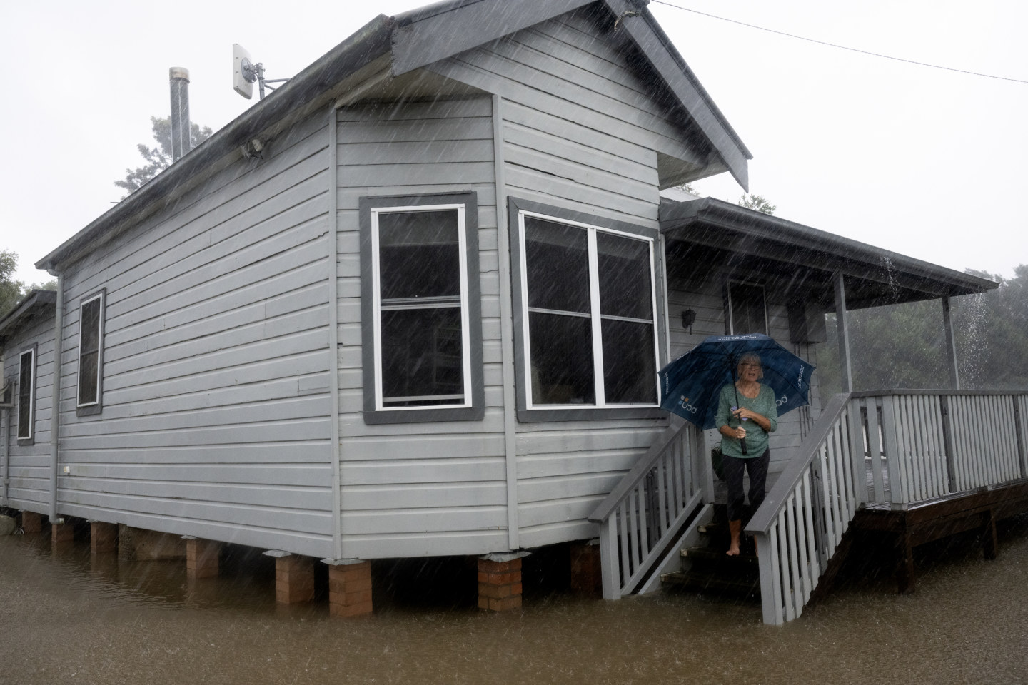 Cyclone Alfred in pictures: erosion, floods, rain and wind