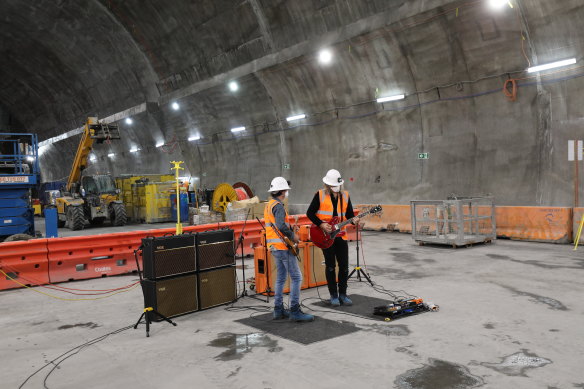 Powderfinger guitarists rock the rails in exclusive underground gig