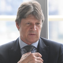 Rob Nicholls, who helped source the $300 billion for programs such as ...