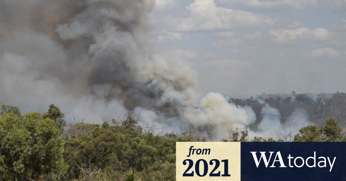 Wanneroo fire warning downgraded as blaze brought under control