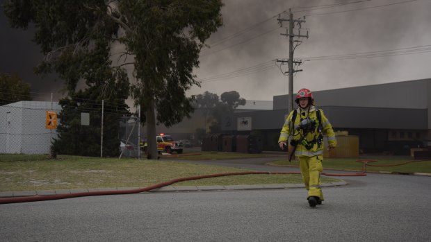 Perth factory fire contained after burning for more than 24 hours