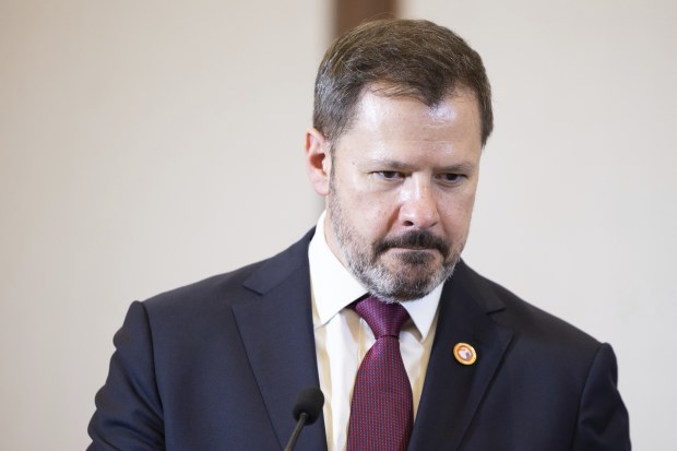 ‘I’m asking you to invest’ Ed Husic tells investment bankers