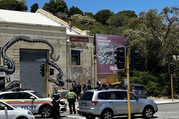 Lengthy pursuit ends in Fremantle after driver climbs roof of Naval Store