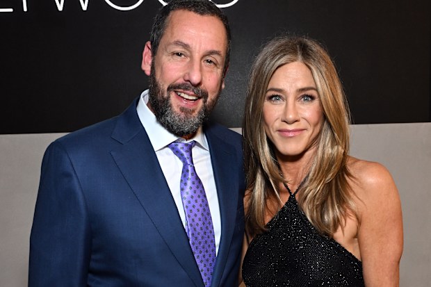Adam Sandler wearing a hoodie at wife Jackie’s Office Romance premiere ...