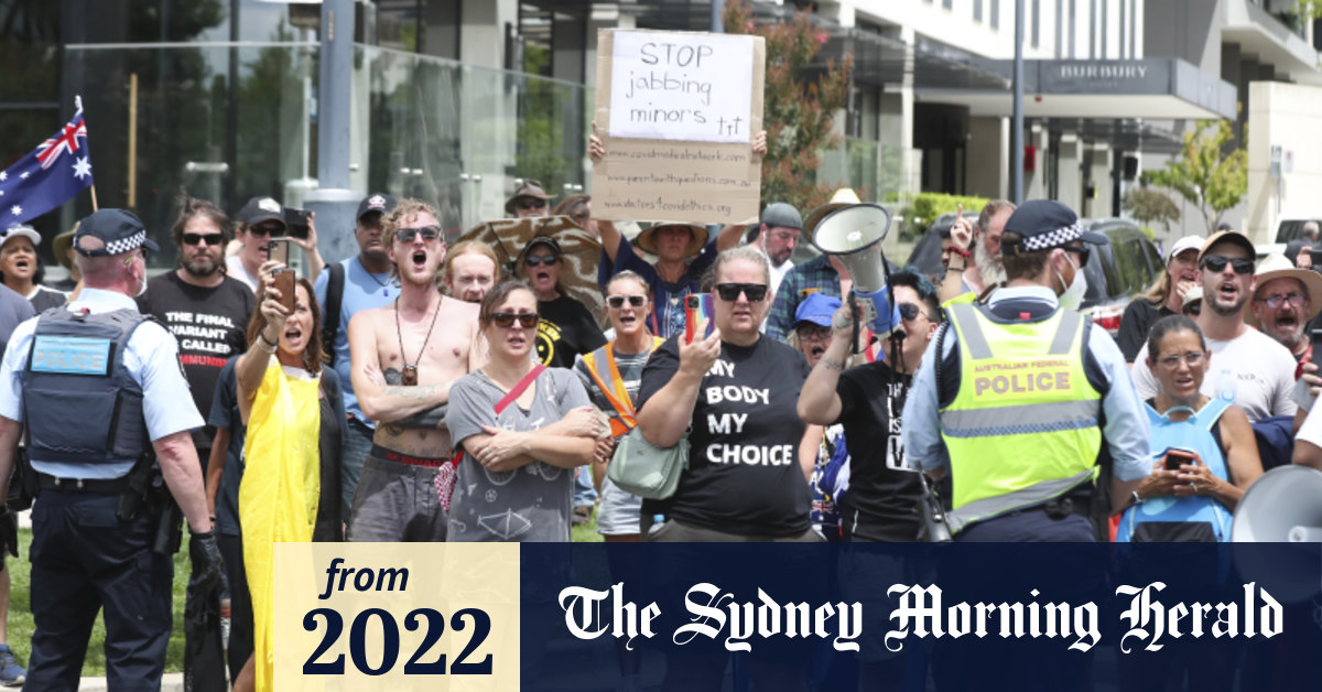 Anti-vaccination mandate protesters encircle National Press Club