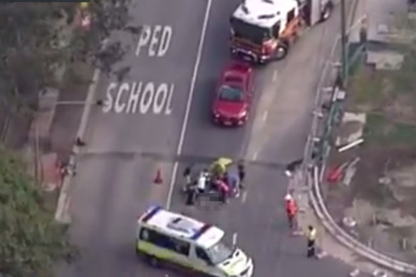 Cyclist dead after collision with car outside Indooroopilly school