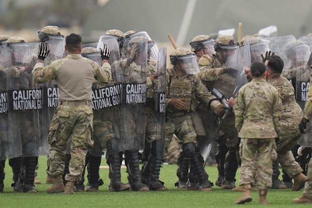 LA riots: US National Guard troops given power to detain protesters