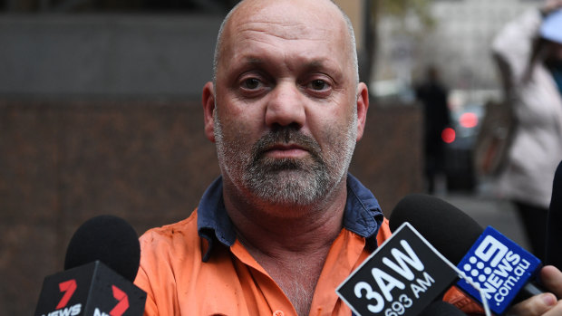 Father of brothers accused of bashing top cop joins sons in custody