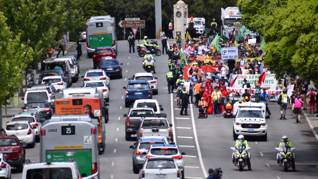 Protesters block Perth city bridge as they march for action on climate ...