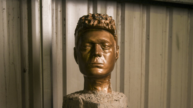 Golden Head: Pushed over, stashed away: guerrilla statue lives as ...