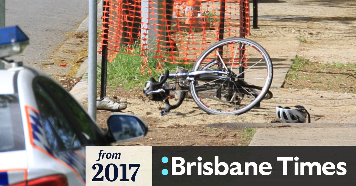 Police investigate road surface after cyclist's death