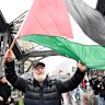 Pro-Palestine protesters march across the Sydney Harbour Bridge yesterday.