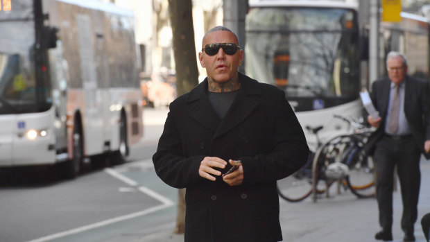 Early nights and $951 fine for ex-bikie who bashed restaurant 'creep'