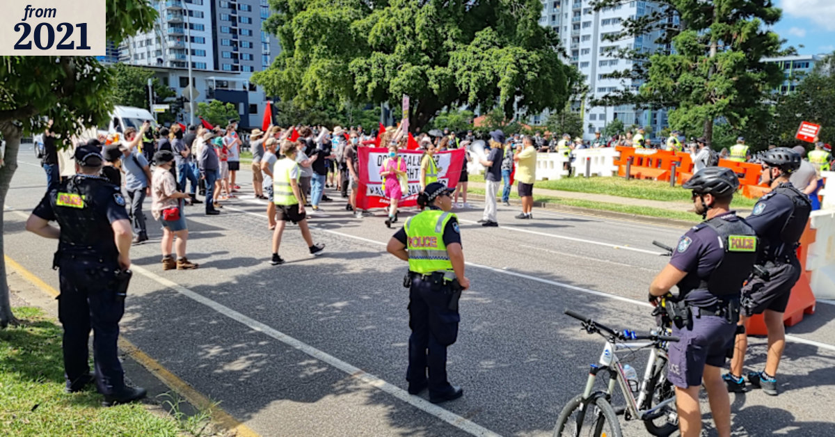 Vaccine supporters have a jab at anti-vax protesters at Brisbane rally