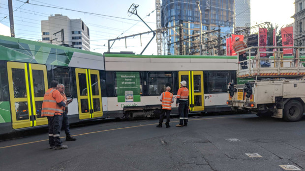 How do trams come off rails and why can it take hours to get them back?