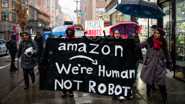 'We can see your greedy side': Amazon critics rally outside Jeff Bezos ...