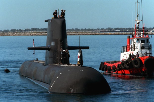 Australia defence: New doubts over ageing submarines after floods, fire ...