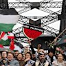 Pro-Palestine protesters march across the Sydney Harbour Bridge to bring attention to the humanitarian crisis in Gaza. 