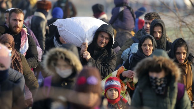 Greece pushes back migrants after Turkish border 'onslaught'