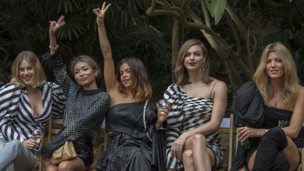 Social Seen: Models manage to stay upright on Aje's secret garden runway