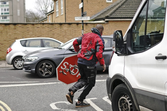 Banksy artwork: Man suspected of stealing Banksy stop sign is arrested ...
