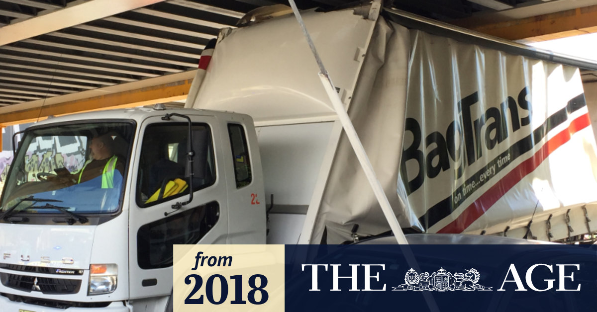 Truck on Inkerman Street hits rail bridge in St Kilda East