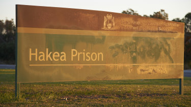 Two people charged with murdering Hakea Prison inmate
