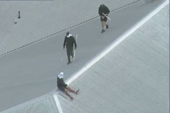 Prisoners armed with metal poles scale roof of maximum security prison