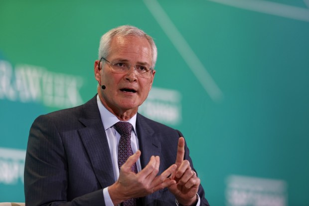 ExxonMobil chief Darren Woods’ pay jumps 52pc after oil boom