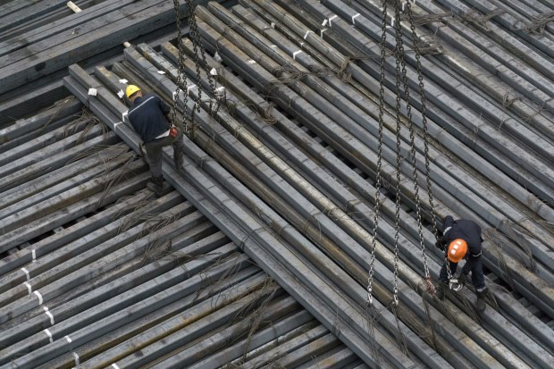 Iron ore to drop to $US100 a tonne by year end: Capital Economics