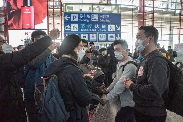 COVID-zero ends: China’s open borders spark rush home