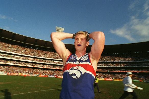 From the Archives, 1997: Dogs stumble as Crows soar into the decider ...