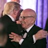 Rupert Murdoch and then US president Donald Trump embrace at a function in 2017.