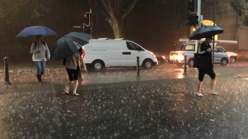 Sydney weather: heavy rain, storms hit Sydney causing commuter chaos