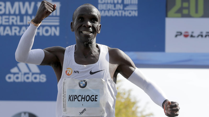 Olympic champion Eliud Kipchoge breaks marathon world record, winning ...
