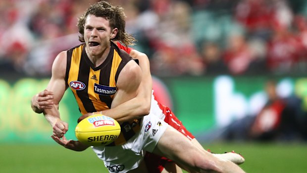 AFL match report: Hawks overrun Swans to grab top-four berth