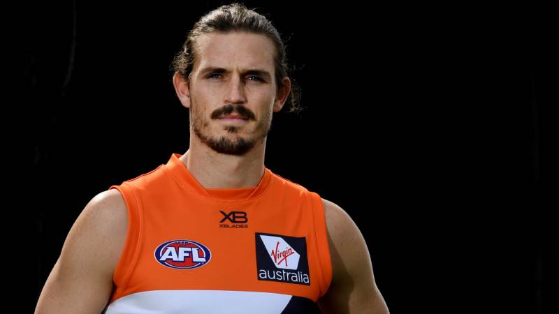 Phil Davis' football worlds collide in Canberra