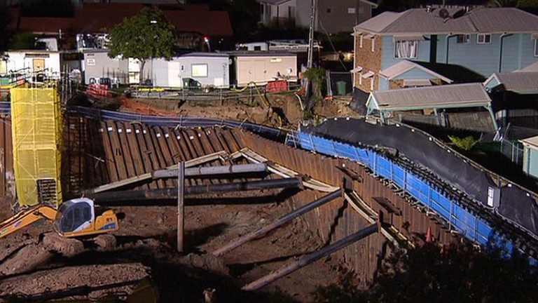 Excavation blamed for retaining wall collapse which forced resident ...