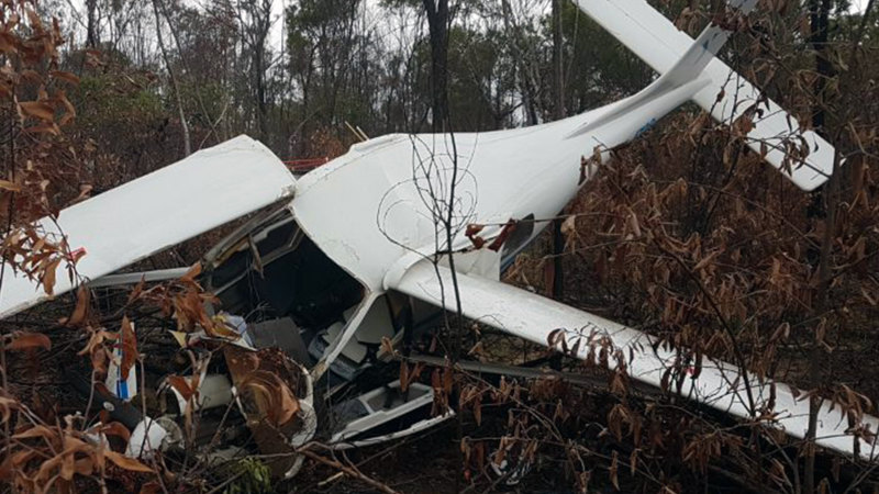 Pilot walks from Queensland crash that tore wing from plane