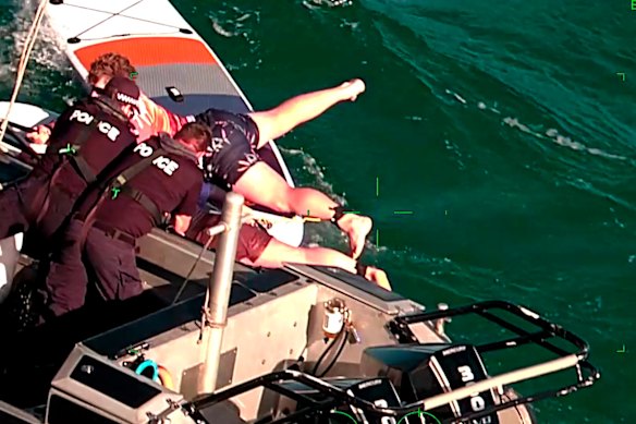 Two paddleboarders saved after being swept across Port Phillip Bay