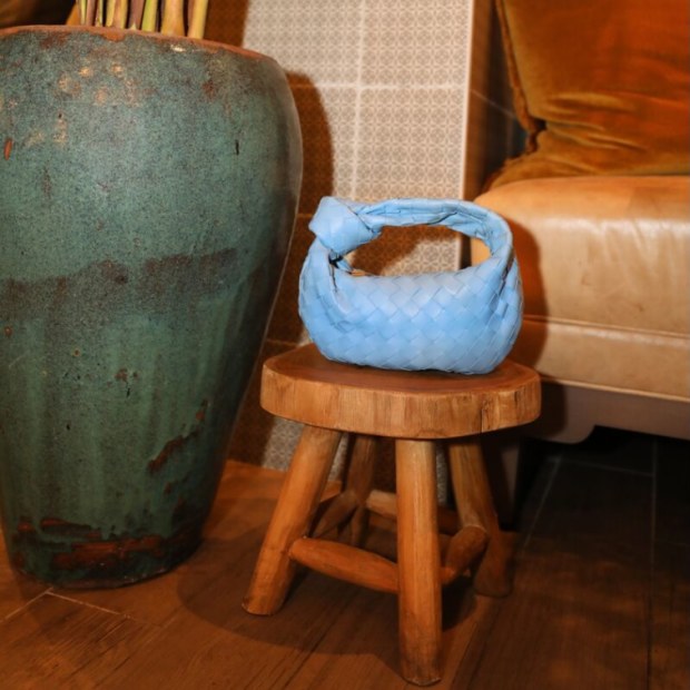 Restaurant purse stools for luxury handbags are becoming widespread ...