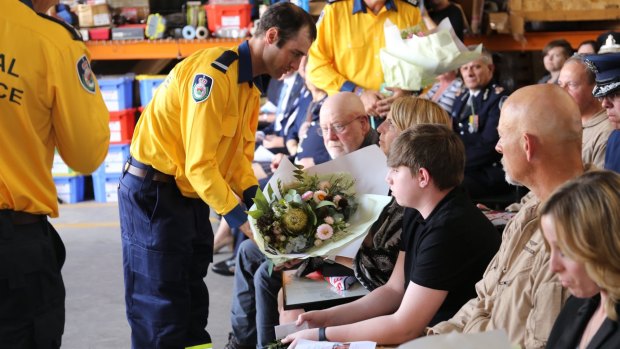 Flags and flowers at memorial for US airmen killed in NSW crash