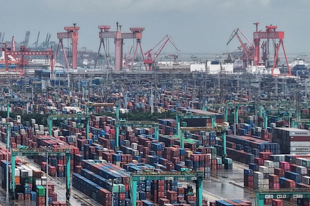 China emerges from trade chaos with record exports, surplus