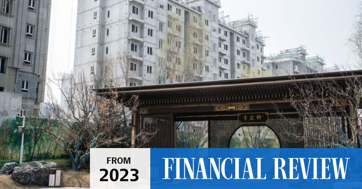 Evergrande pushes debt overhaul after revealing $119b loss