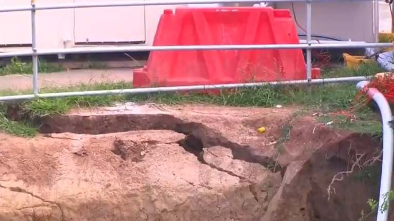 Excavation blamed for retaining wall collapse which forced resident ...