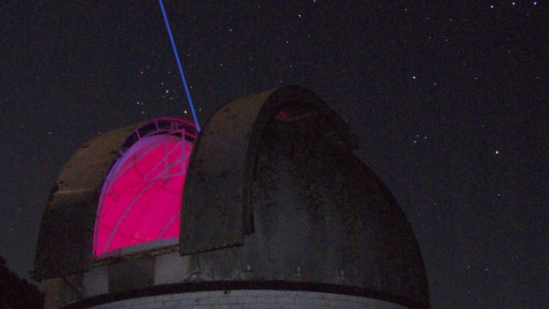 High over big city's bright lights, old observatory finds new audience