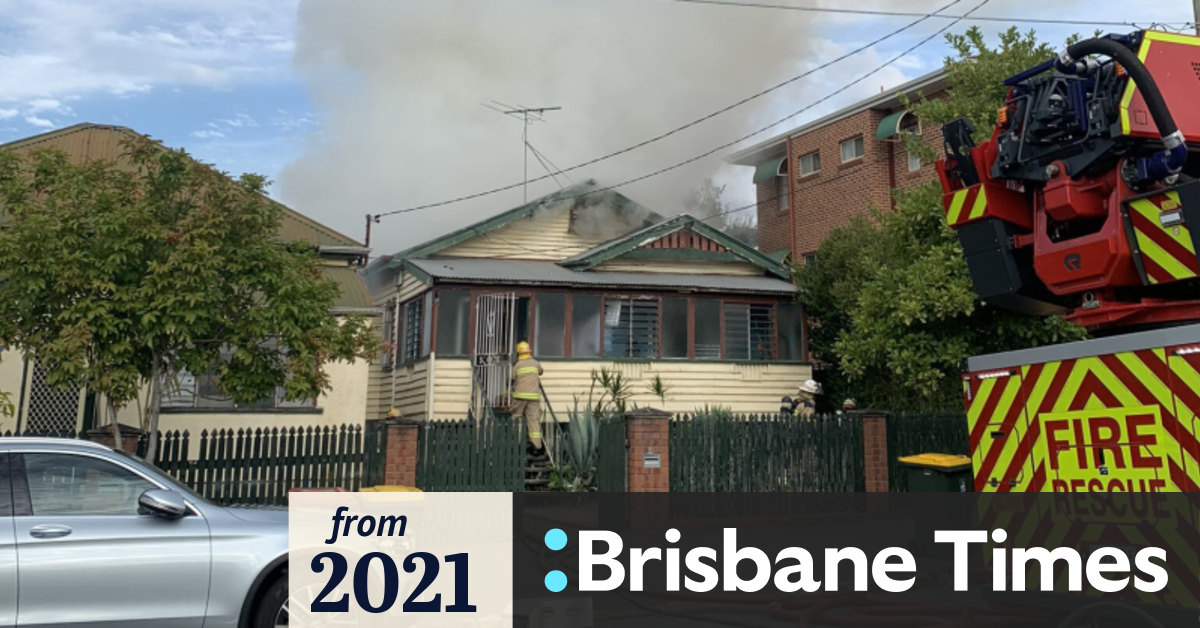 Man rushed to hospital after house fire in Brisbane’s inner north