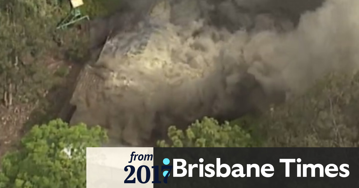 Smoke pours into inner-city skyline as Brisbane house goes up in flames