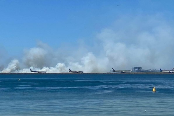 Qantas emergency landing triggers fire at Sydney Airport