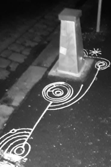 The story behind the cryptic drawings appearing on Melbourne footpaths
